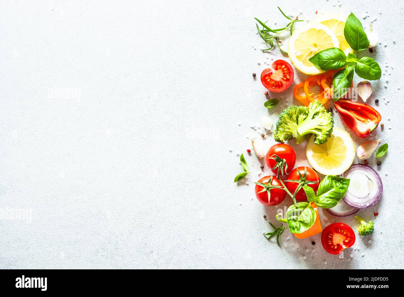 Food cooking background on white table Stock Photo - Alamy