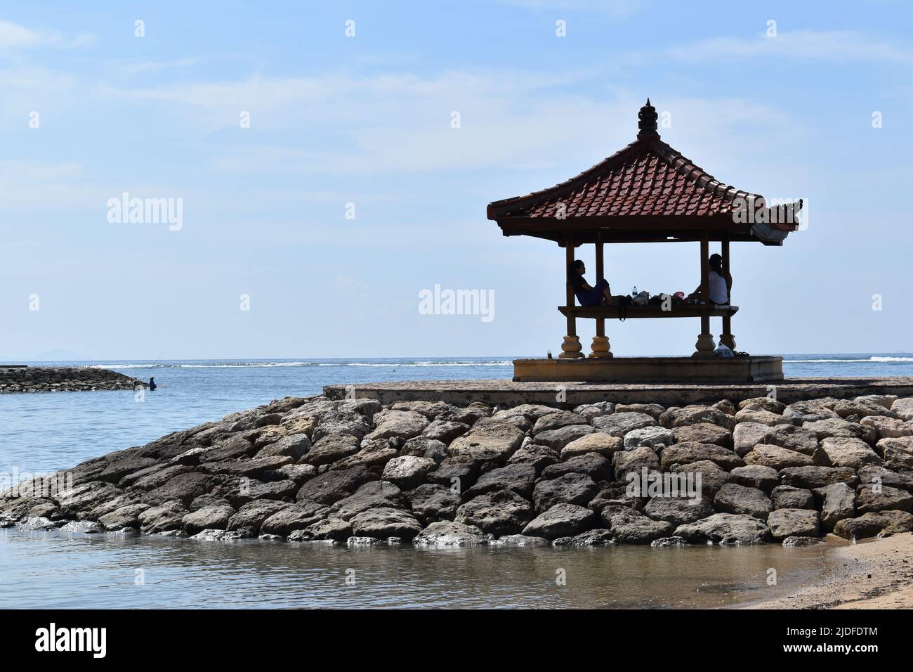 Bali beach pier platform Stock Photo - Alamy