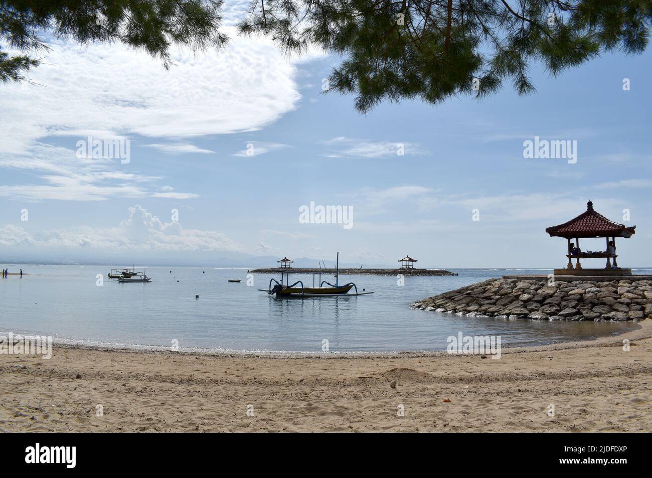 Bali beach under the shadow Stock Photo - Alamy