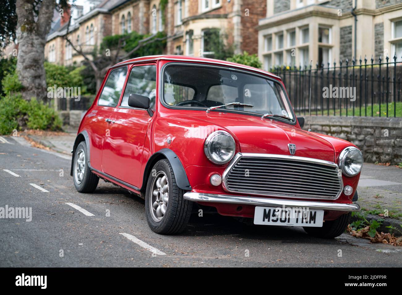 Rover Mini 1995 classic car in red parked on UK street in Bristol Stock ...