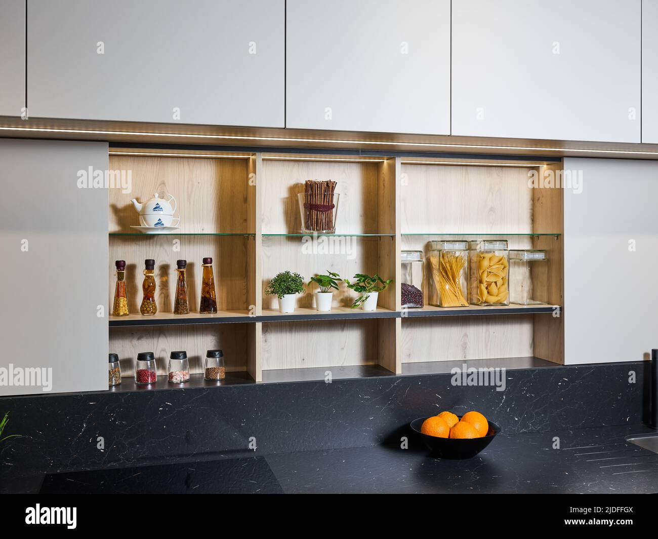 Promotional photograph of a kitchen using flash Stock Photo - Alamy