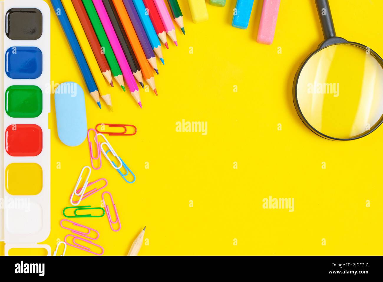 School supplies and stationery yellow background.Preparing child for ...