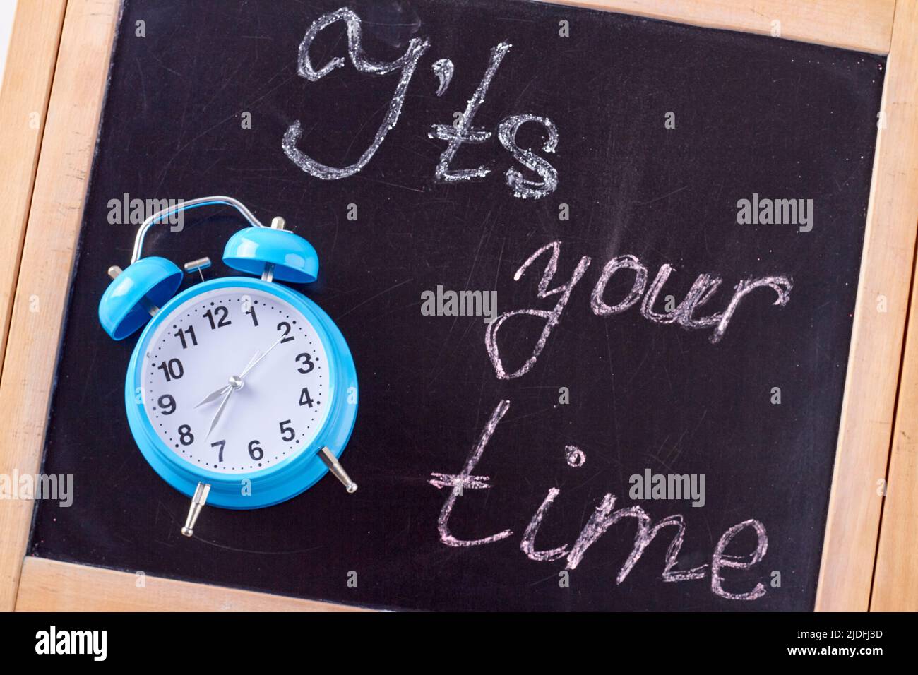 Its your time words written on chalkboard. Blue retro alarm clock Stock ...