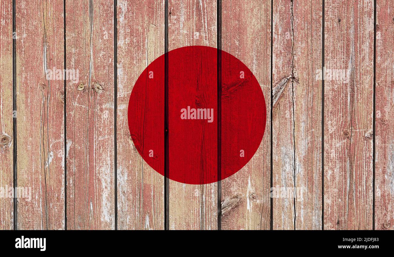 Top view of Old Painted Flag of Japan on Dark Wooden Fence, wall ...
