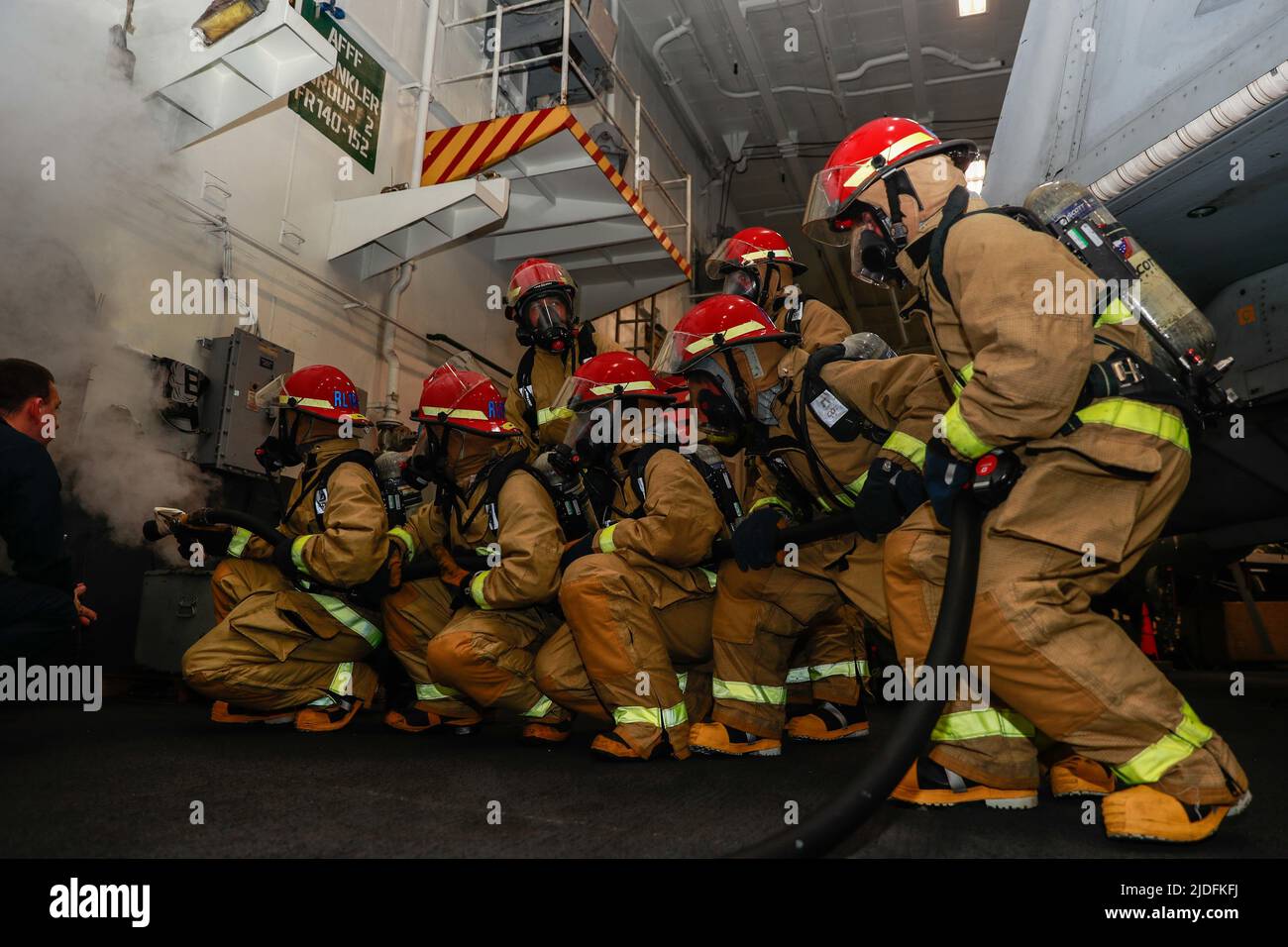 PHILIPPINE SEA (June 17, 2022) Sailors fight a simulated class charlie ...