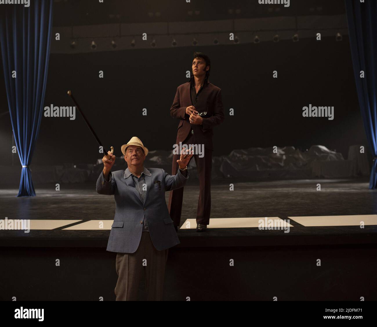 ELVIS, from left: Tom Hanks, as Colonel Tom Parker, Austin Butler, as ...