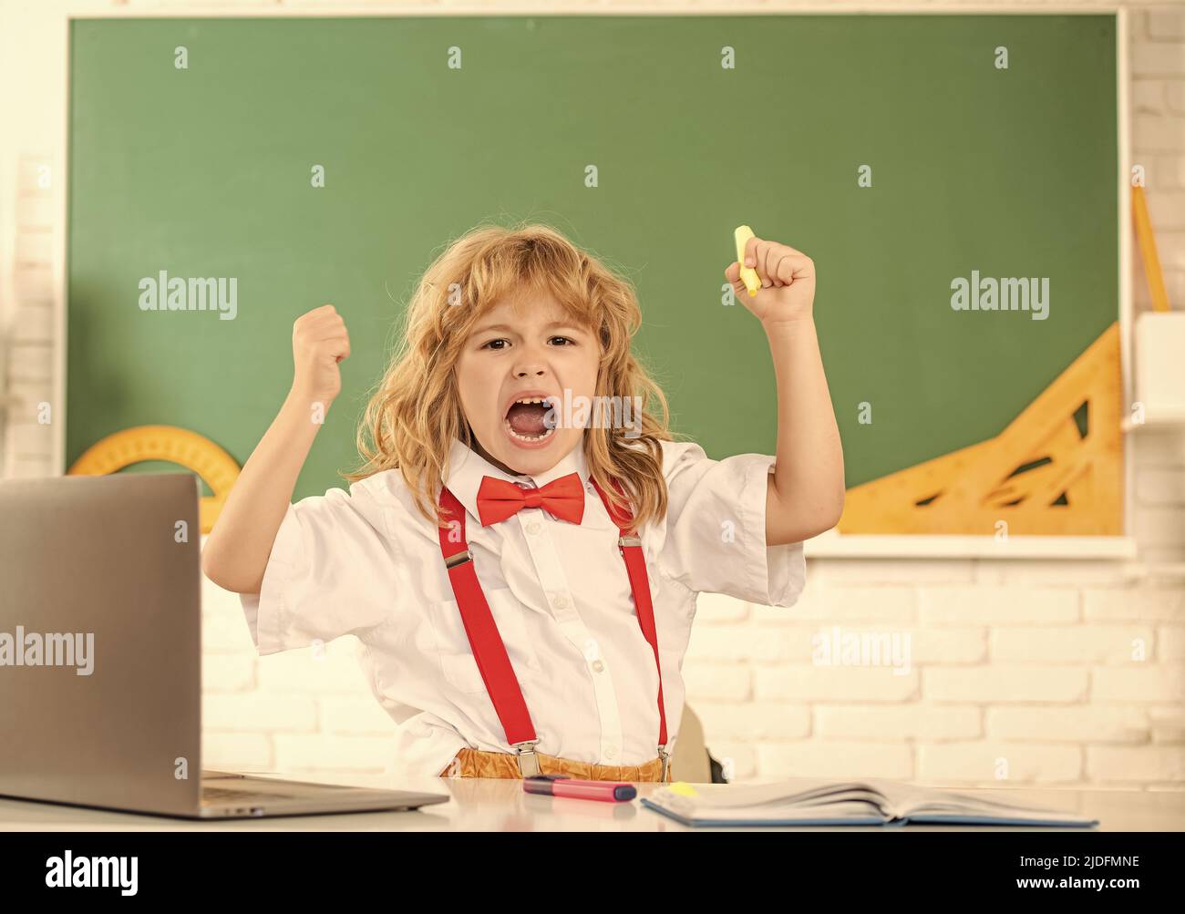 concept of education. nerd kid with long hair at blackboard. september ...