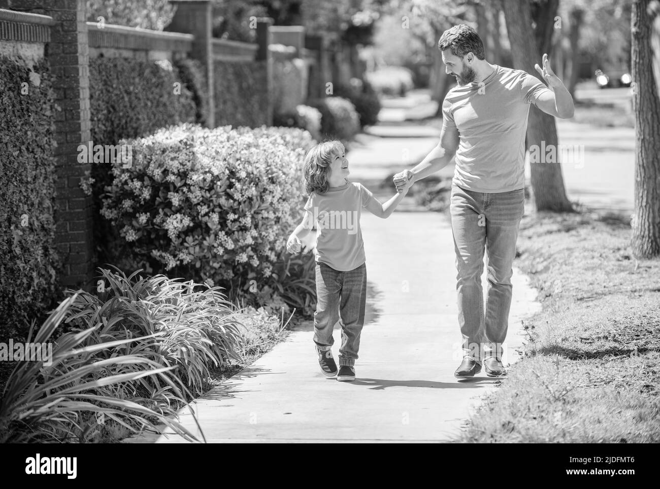 happy dad with child walk together in park, summertime Stock Photo - Alamy