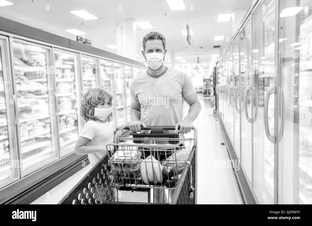 buying food at supermarket. consumption. happy family day Stock Photo ...