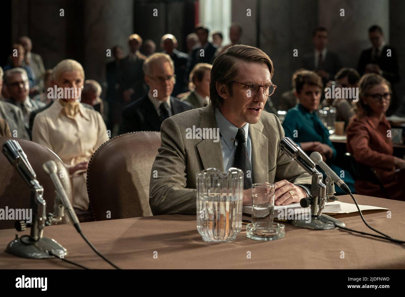 GASLIT, Dan Stevens as John Dean, back row from left: Betty Gilpin as ...