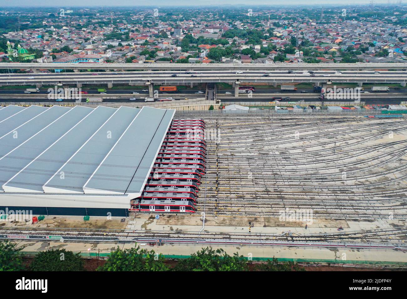 Aerial view of Jakarta LRT train trial run for phase 1 from Bekasi ...
