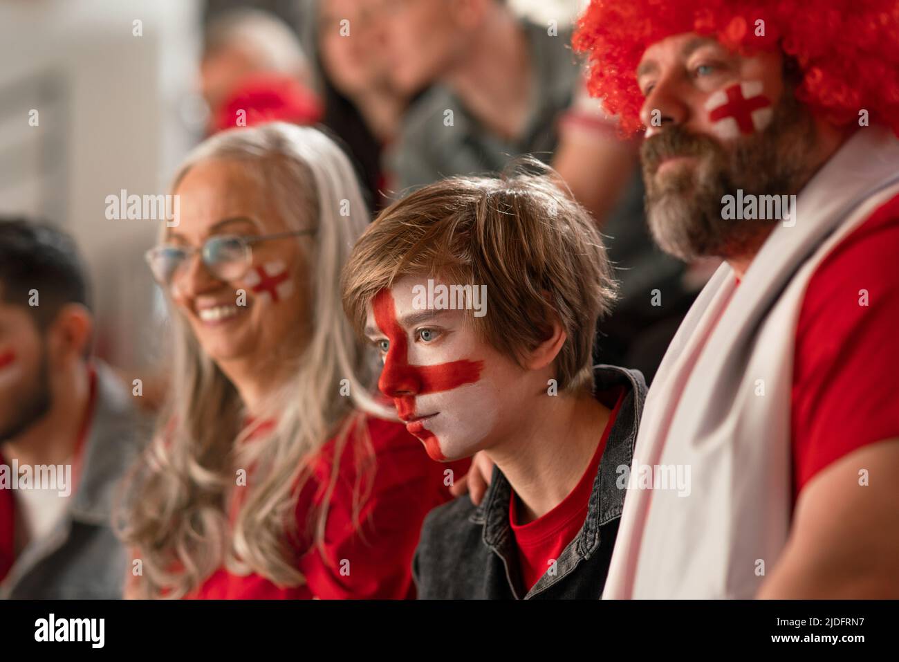 Excited football fans supproting English national team in live soccer ...