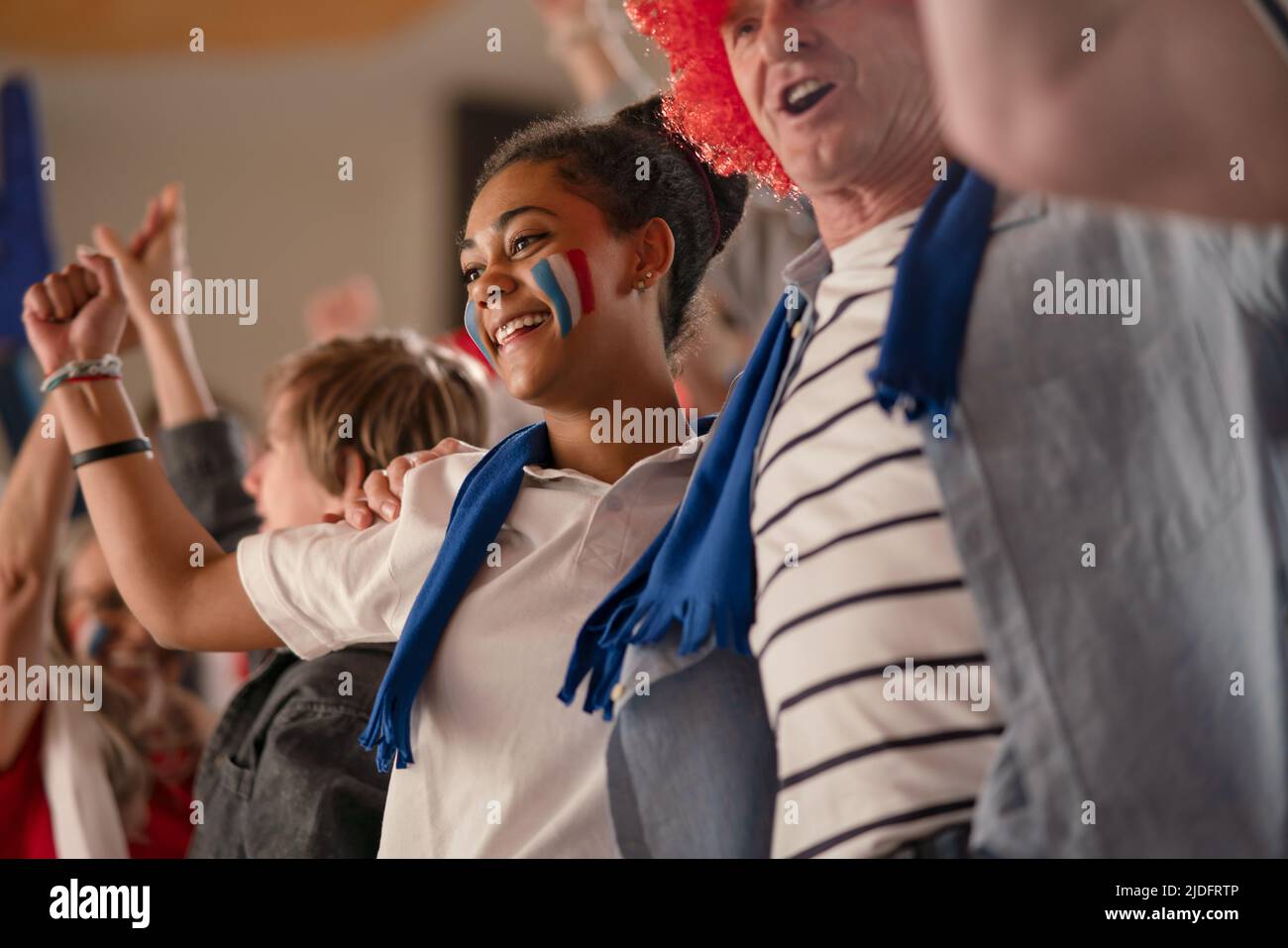 French football fans celebrating their team's victory at stadium Stock ...