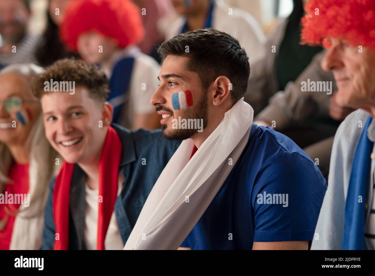 French football fans celebrating their team's victory at stadium Stock ...