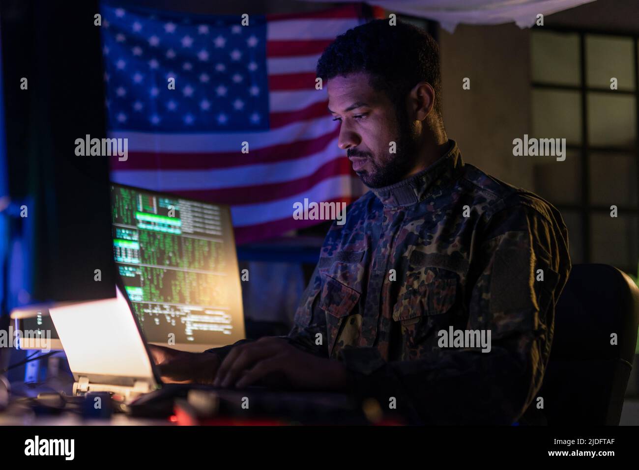 American hacker in military unifrorm on dark web, cyberwar concept ...