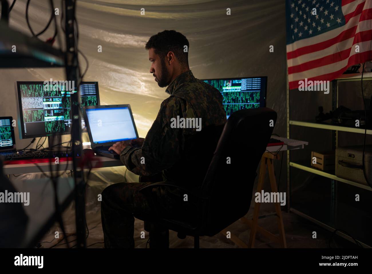 American hacker in military unifrorm on dark web, cyberwar concept ...