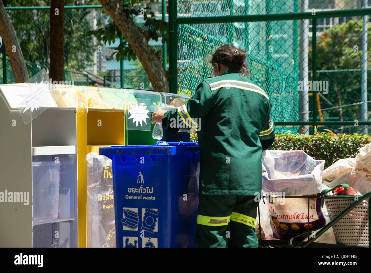 BANGKOK ,THAILAND - JUNE 6 , 2022 : Unidentified female worker is ...
