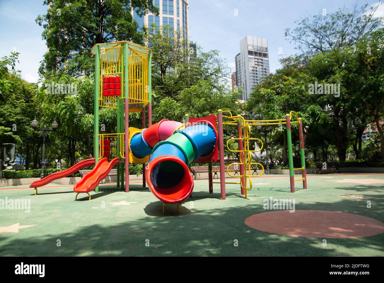 Colorful playground made of plastic empty outdoor playground set playground equipment. Garden ...