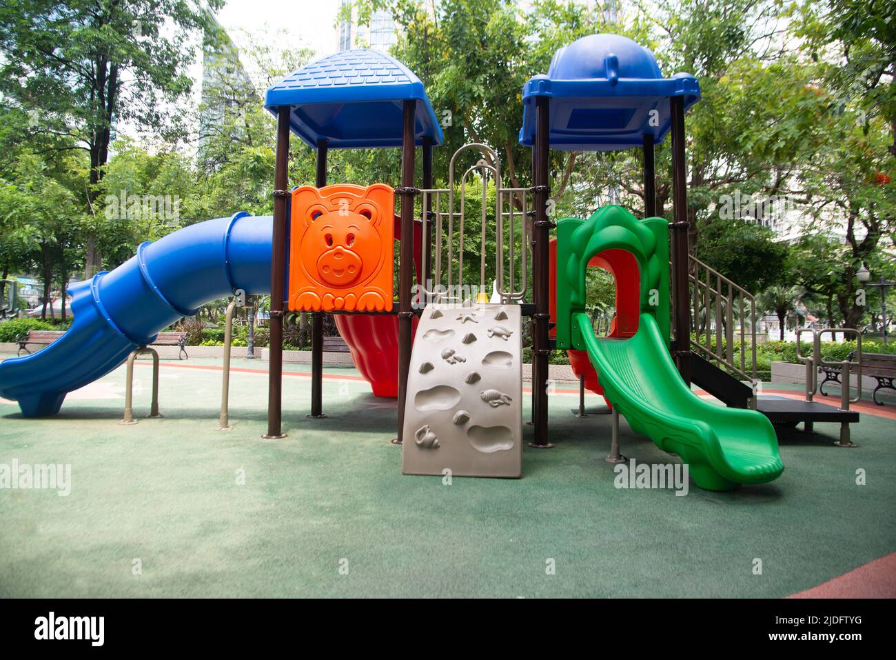 Colorful playground made of plastic empty outdoor playground set ...