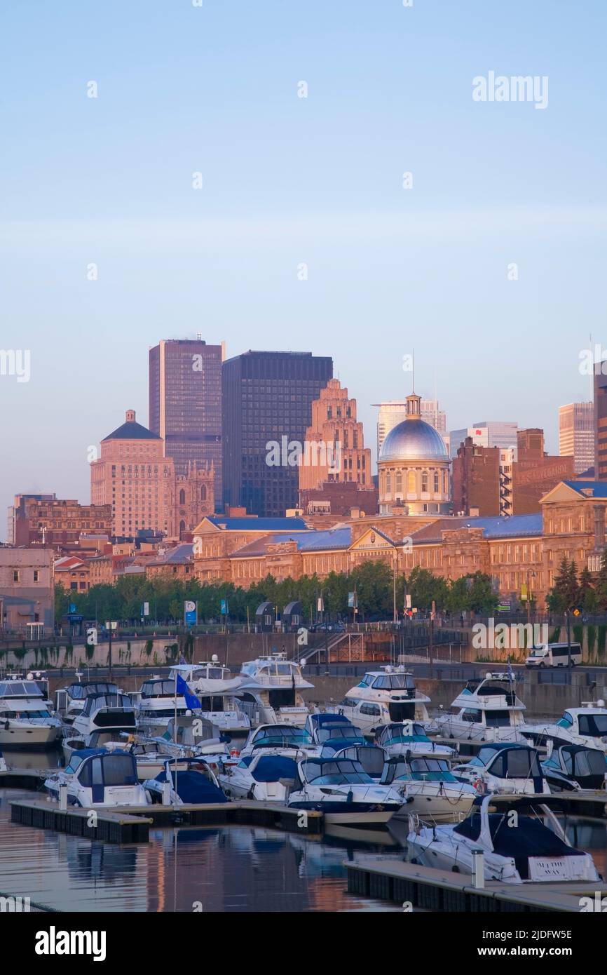 Old Montreal skyline and marina in the Old Port of Montreal at sunrise ...