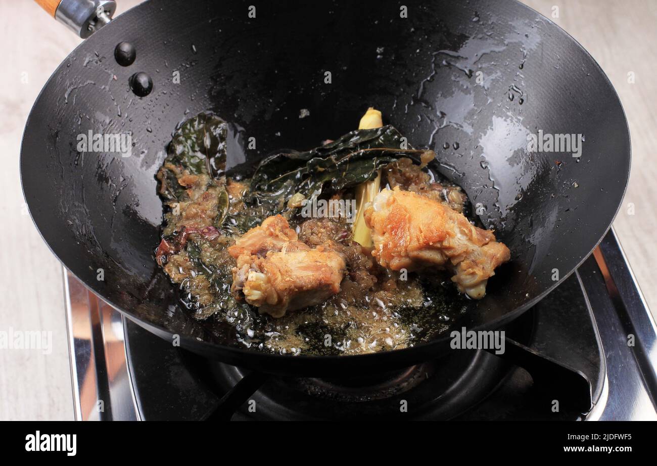 Mix Fried Chicken with Herbs and Spice in a Pan, Cooking Process Making ...