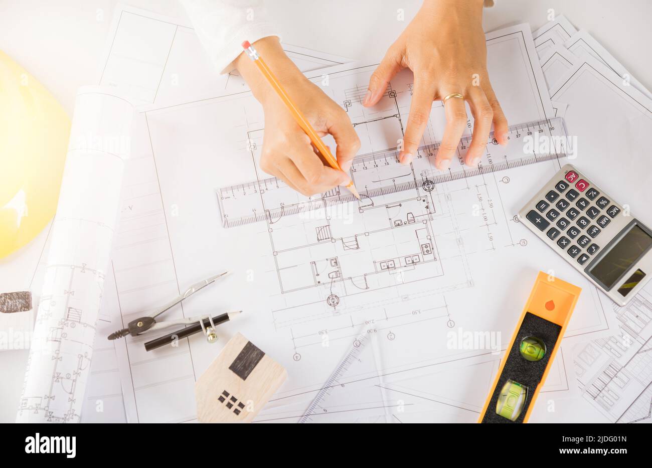 Architectural project workspace. Top view of architect drawing with ...