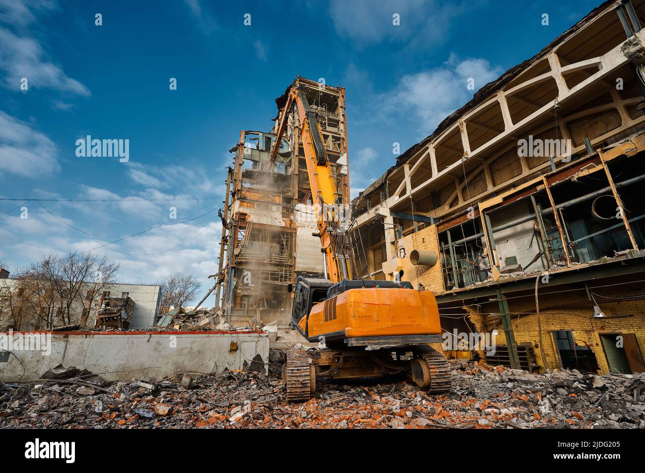 Hydraulic excavators at demolition site of industrial complex Stock ...