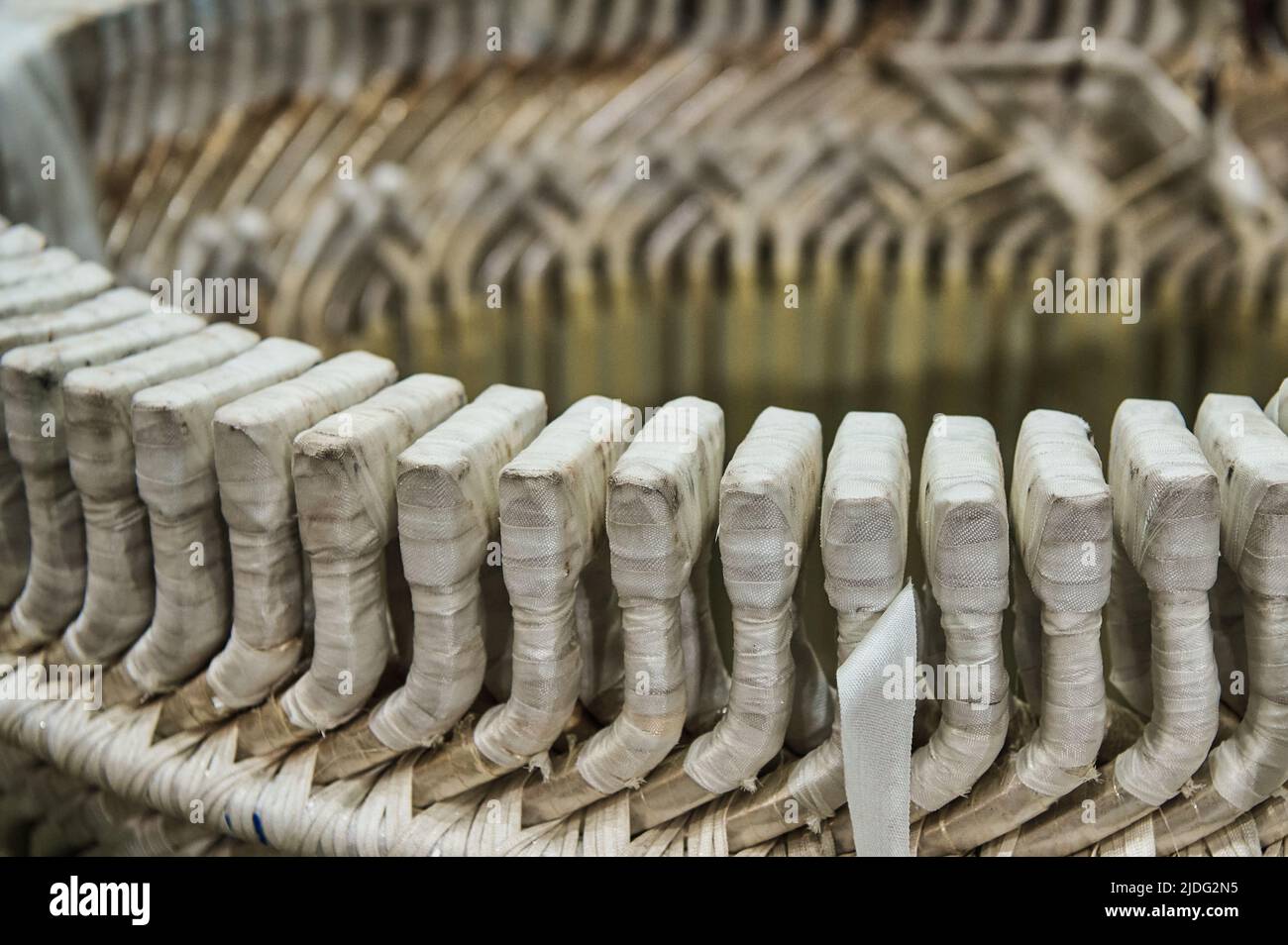 Electric engine stator with copper bus bars and fabric Stock Photo - Alamy