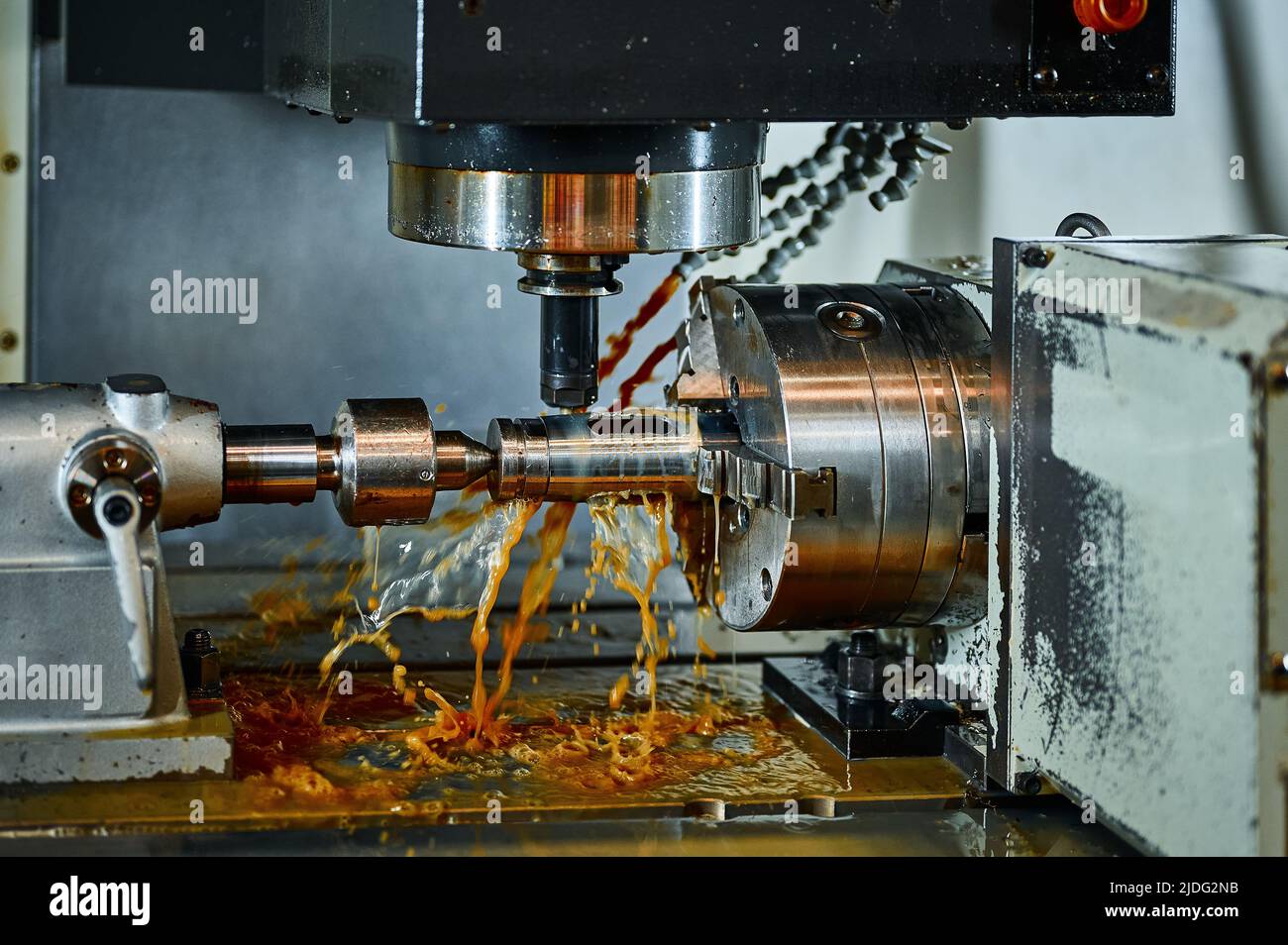 Processing metal detail with lathe machine tool in workshop Stock Photo ...