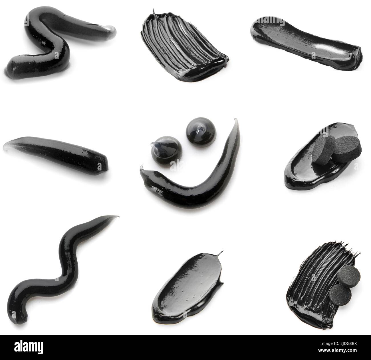 Set of activated charcoal tooth paste isolated on white Stock Photo - Alamy