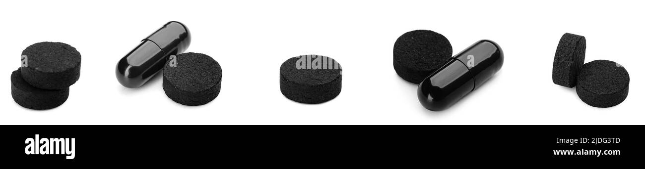 Set of activated carbon pills isolated on white Stock Photo - Alamy