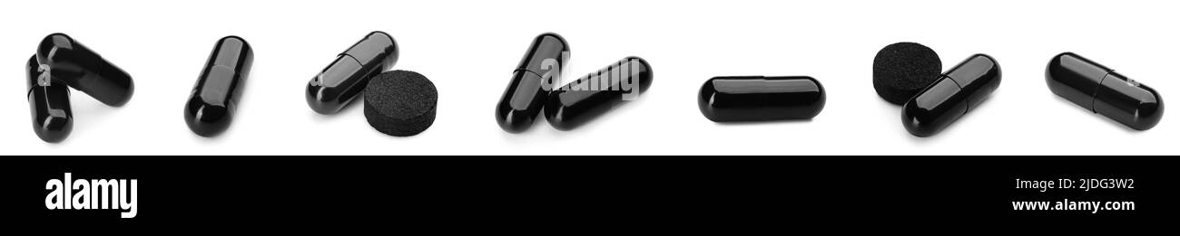 Set of activated carbon pills isolated on white Stock Photo - Alamy