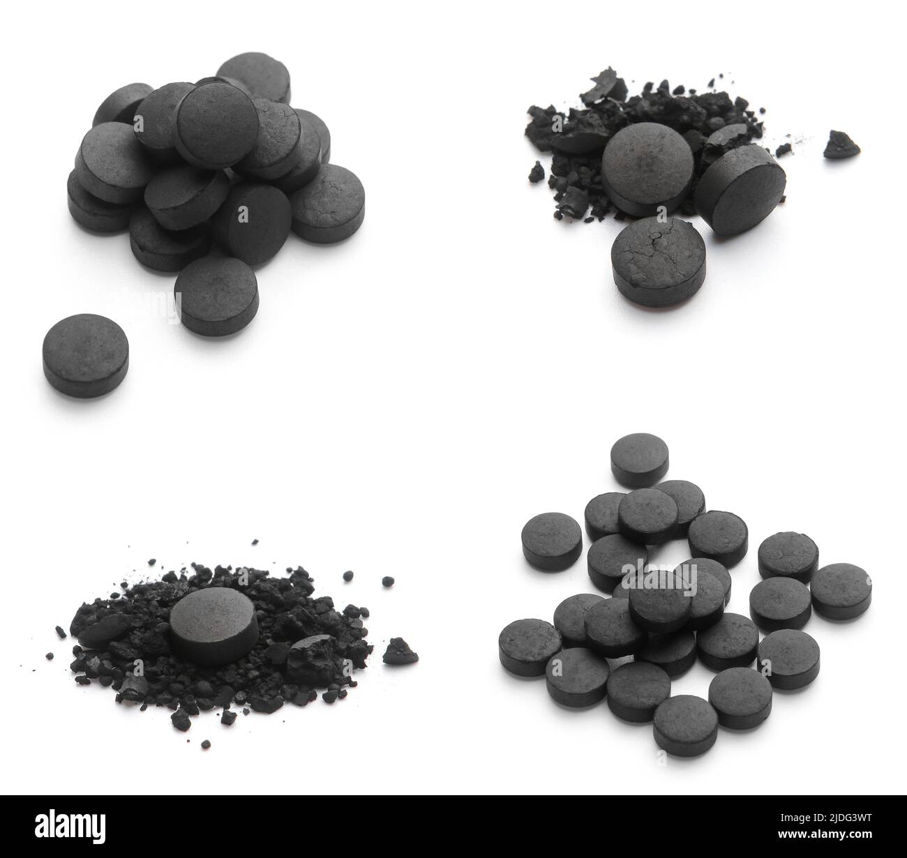 Set of activated carbon pills isolated on white Stock Photo - Alamy