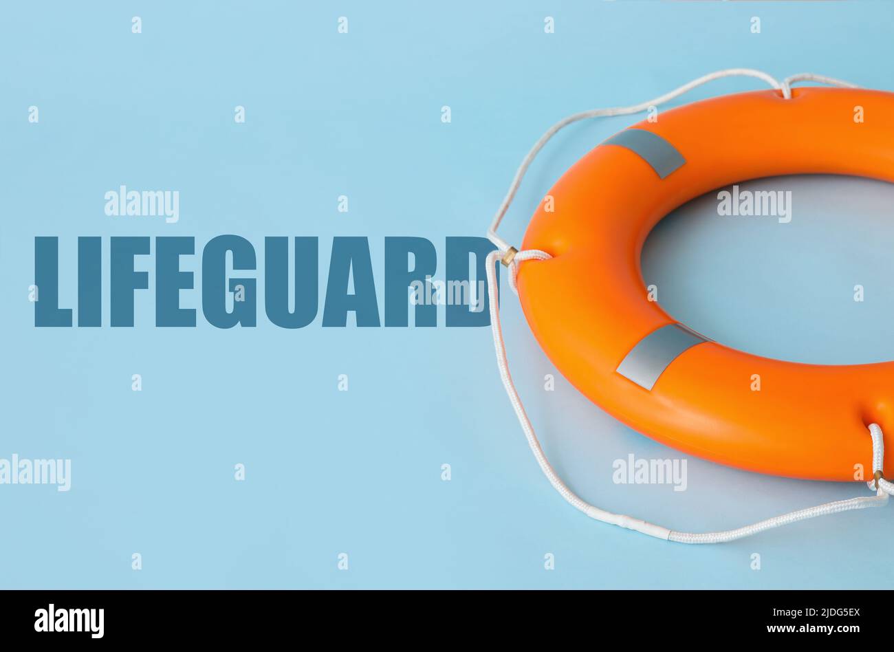 Lifebuoy ring on light blue background Stock Photo - Alamy