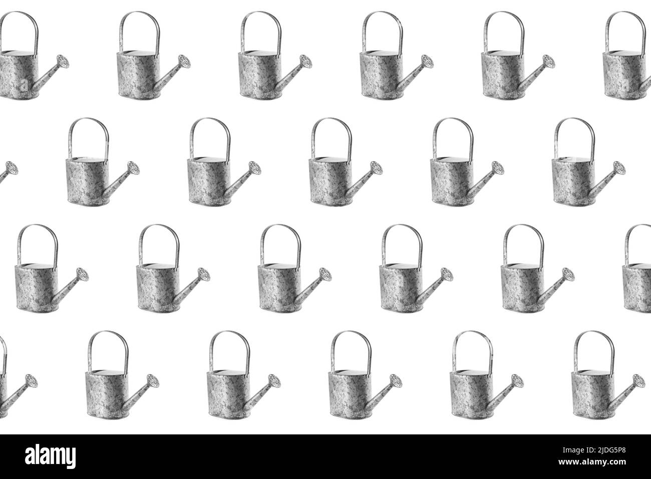 Many watering cans on white background. Pattern for design Stock Photo ...