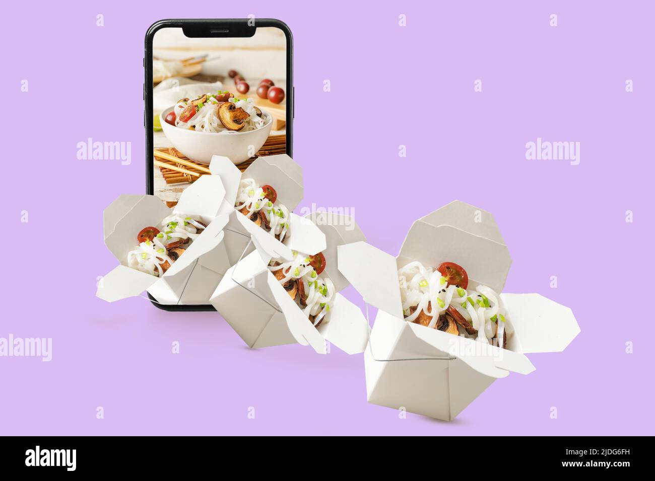 Modern mobile phone and many boxes with tasty Chinese noodles on color ...