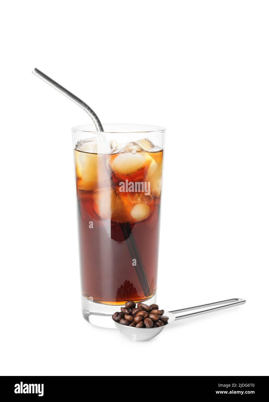 Glass of cold brew with straw and spoon with coffee beans on white ...