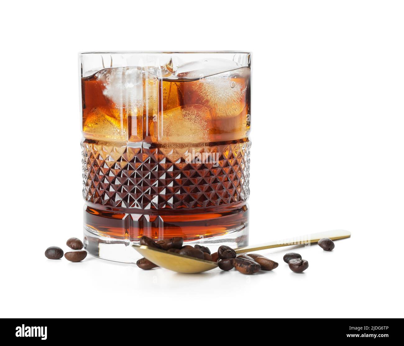 Glass of cold brew and spoon with coffee beans on white background ...