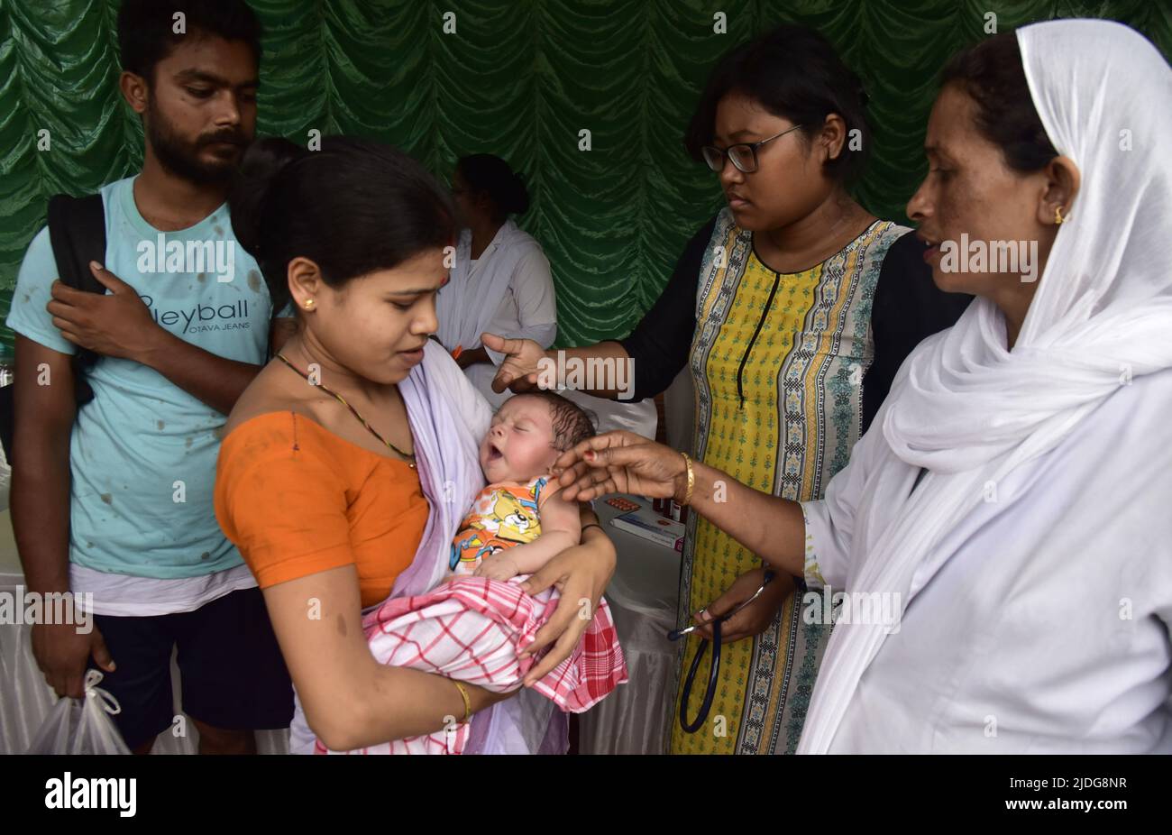 Guwahati, Guwahati, India. 20th June, 2022. A doctor check the body ...