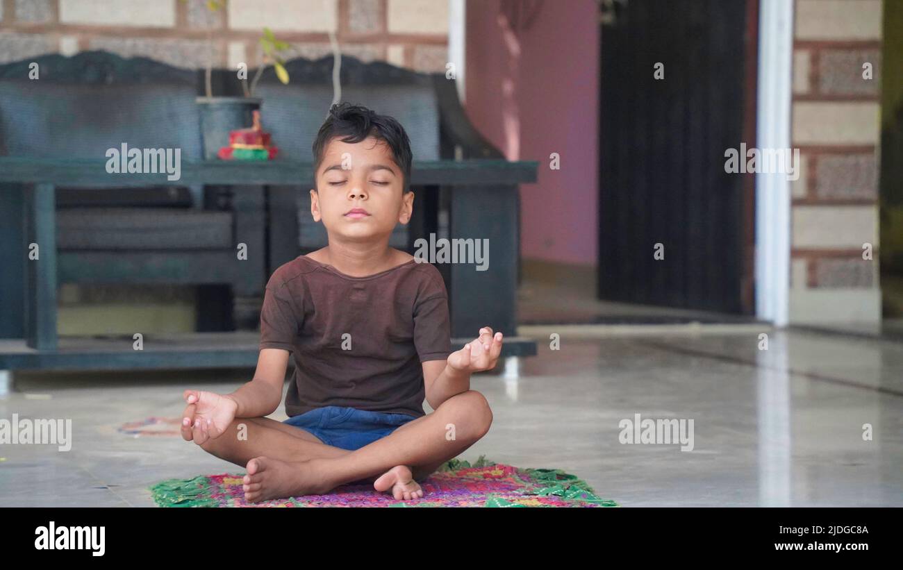 Asian Child doing exercise on platform outdoors. Healthy lifestyle ...