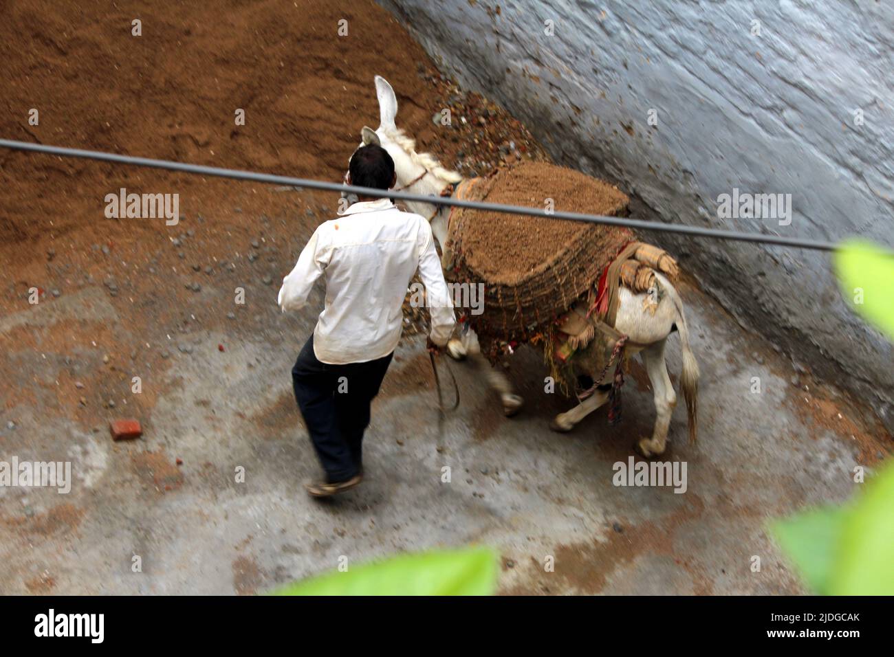 a worker doing work on construction site Stock Photo - Alamy