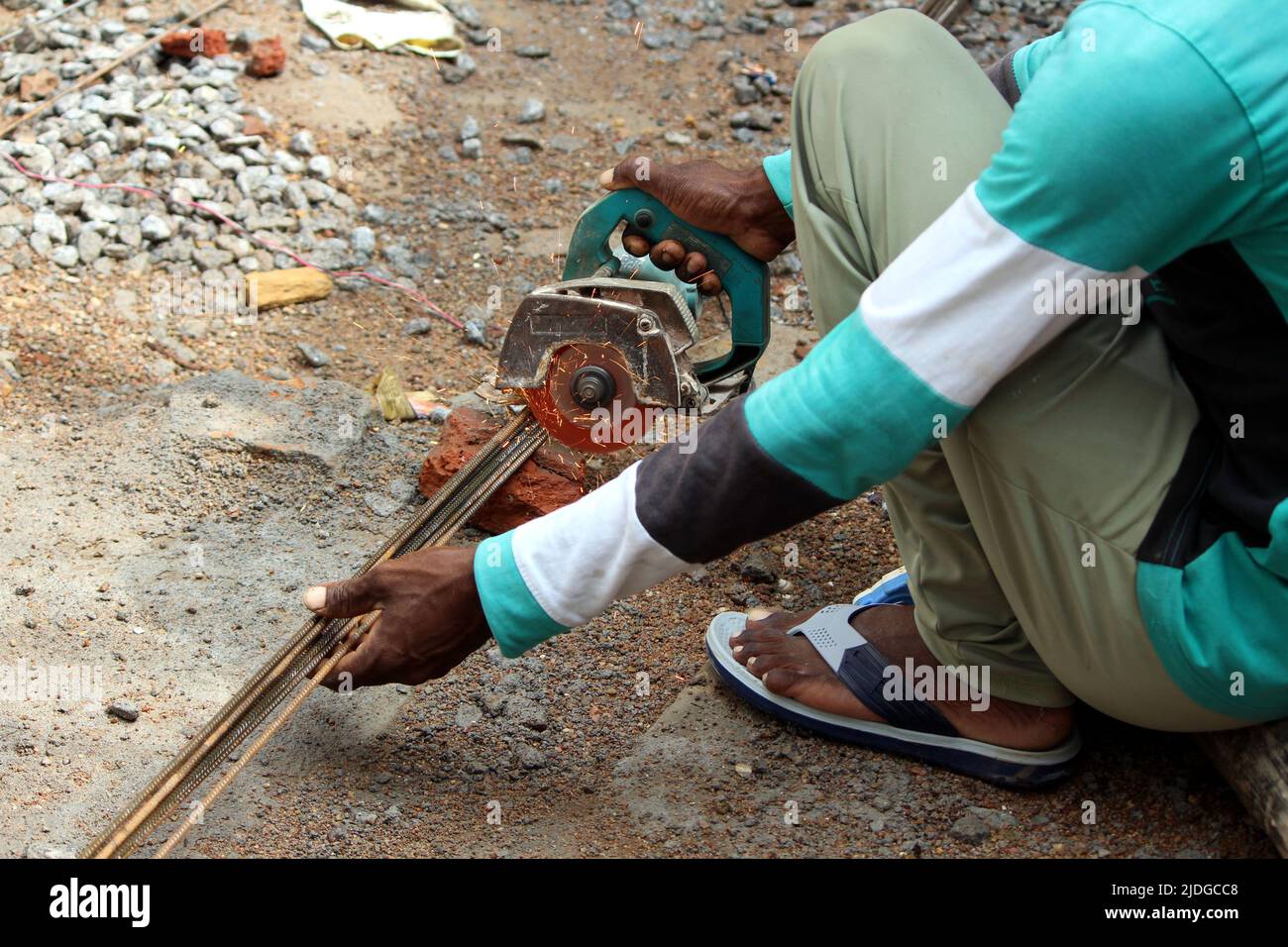a worker doing work on construction site Stock Photo - Alamy