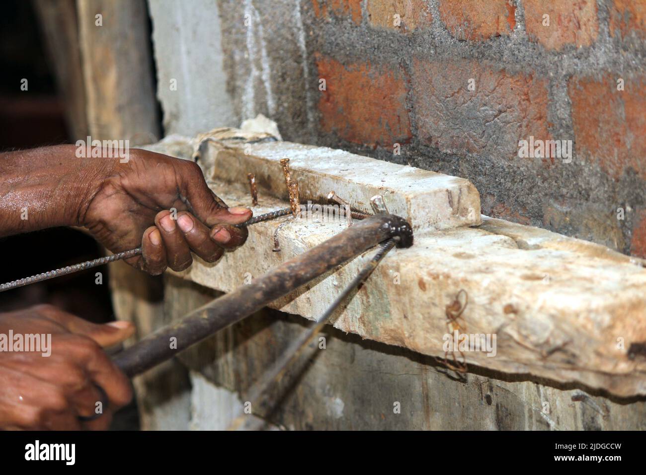 a worker doing work on construction site Stock Photo - Alamy