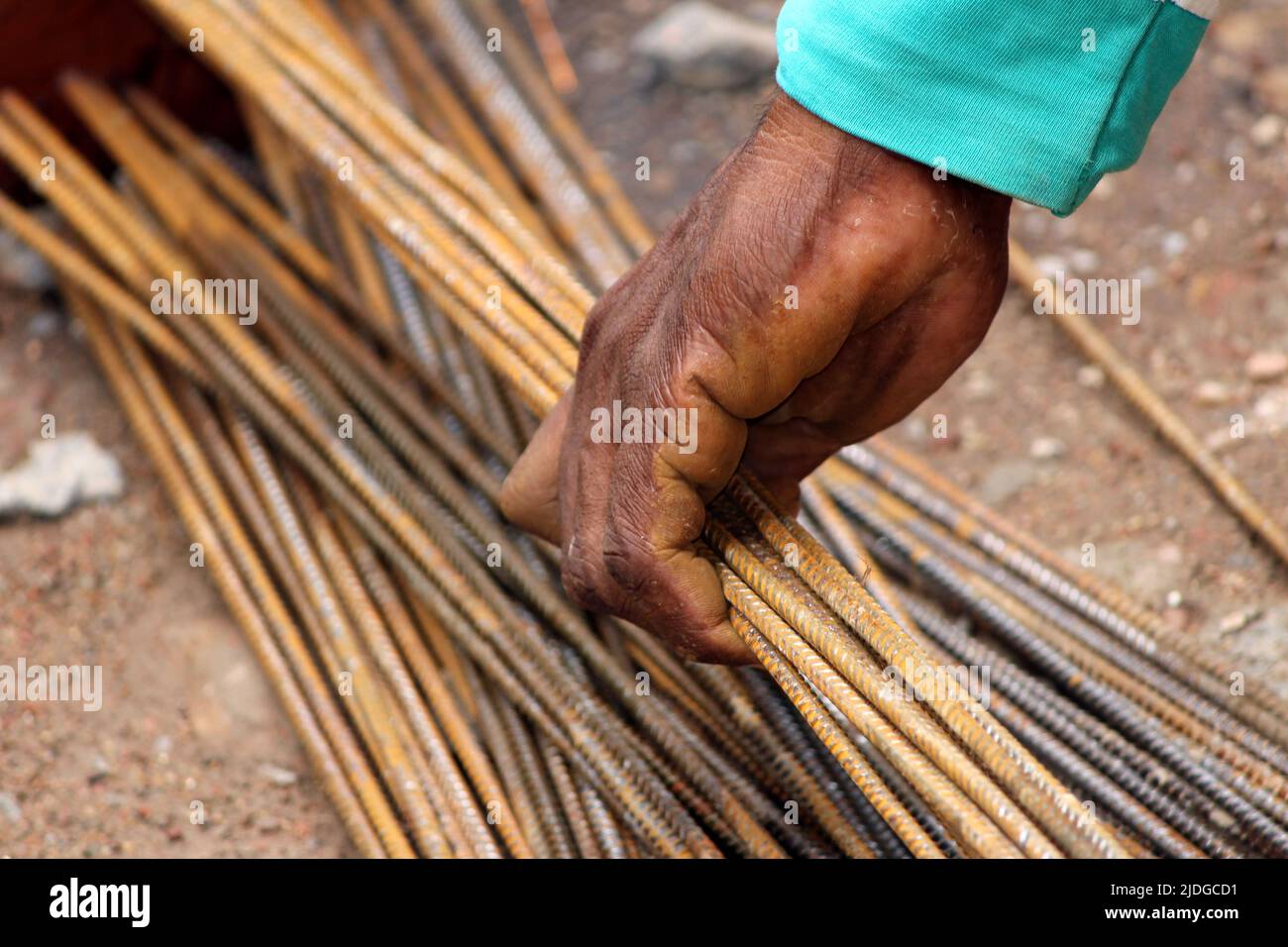 a worker doing work on construction site Stock Photo - Alamy