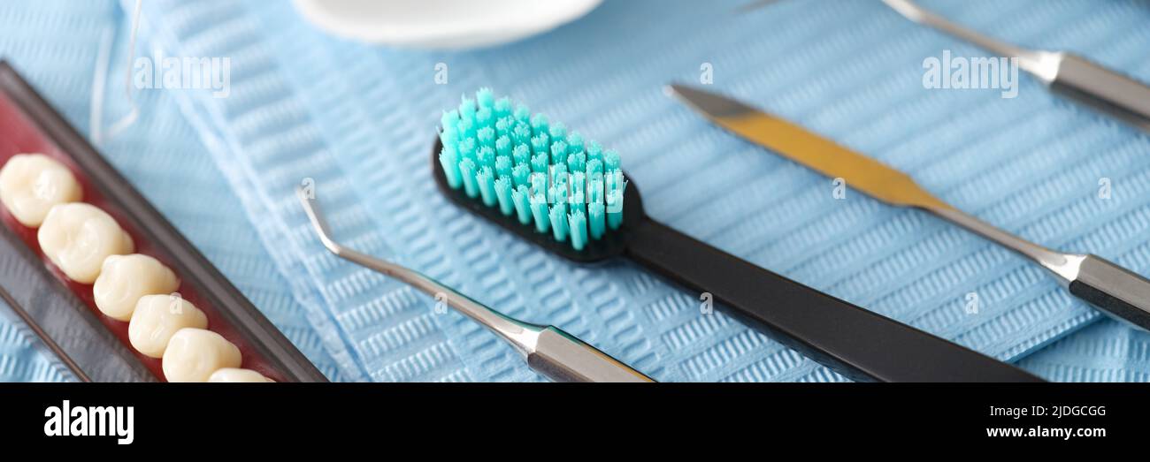 Dental instrument dental floss and dental implants closeup Stock Photo ...