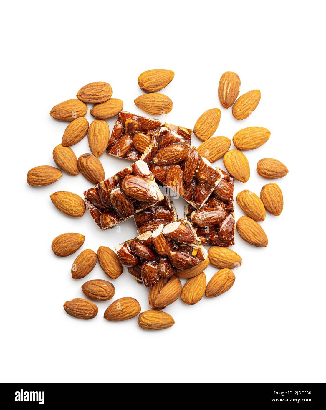 Almond nuts and sweet mini almond bars isolated on a white background ...