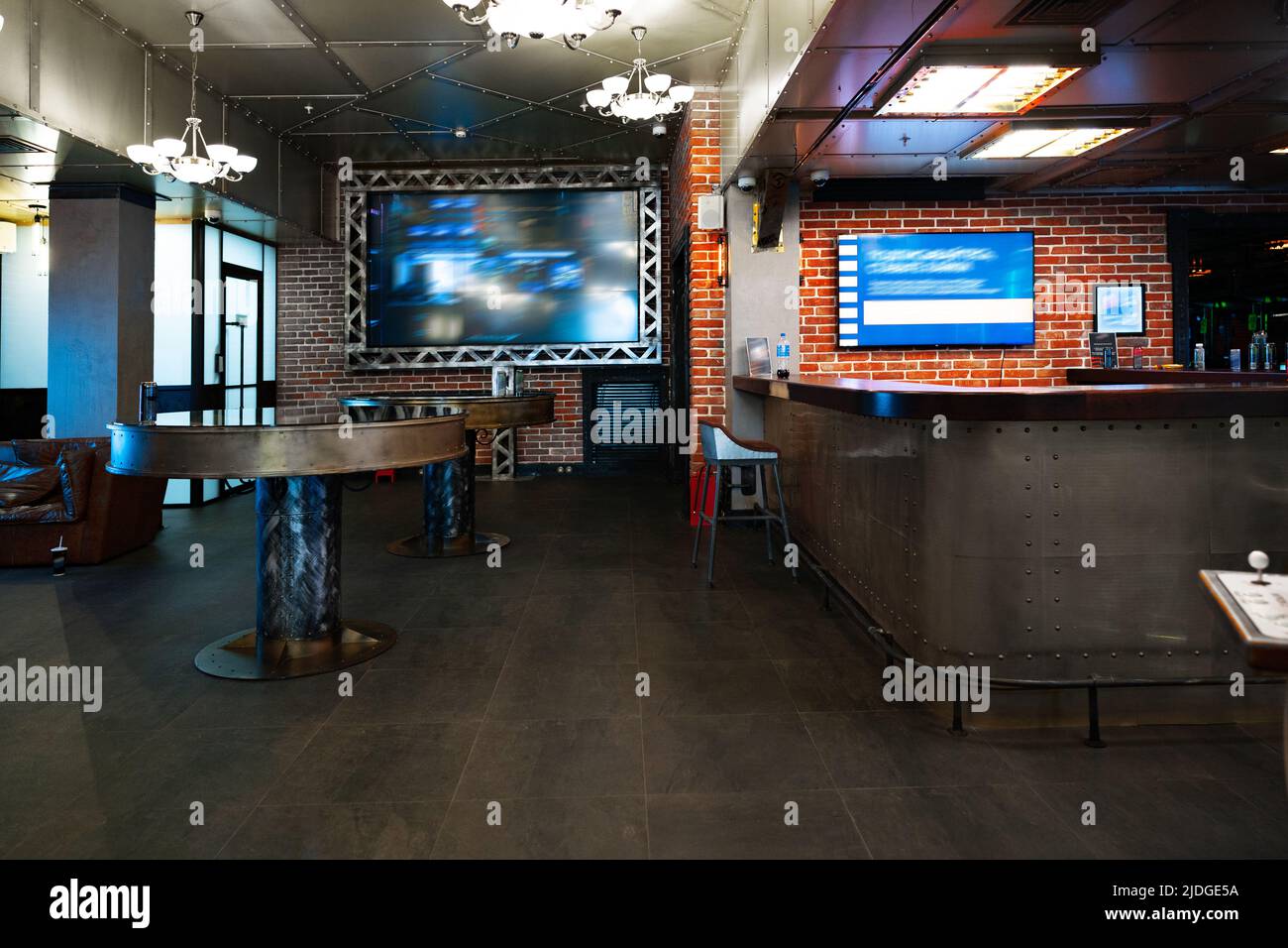 Interior of a dark pub loft interior Stock Photo - Alamy