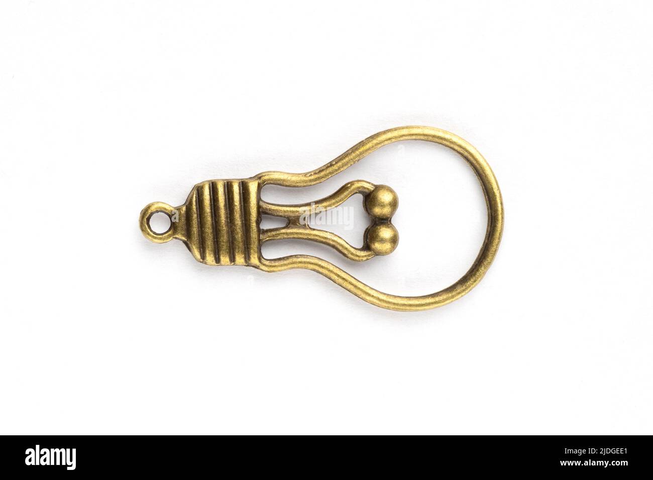 Symbolic image of light bulb made of bronze wire on a white isolated ...