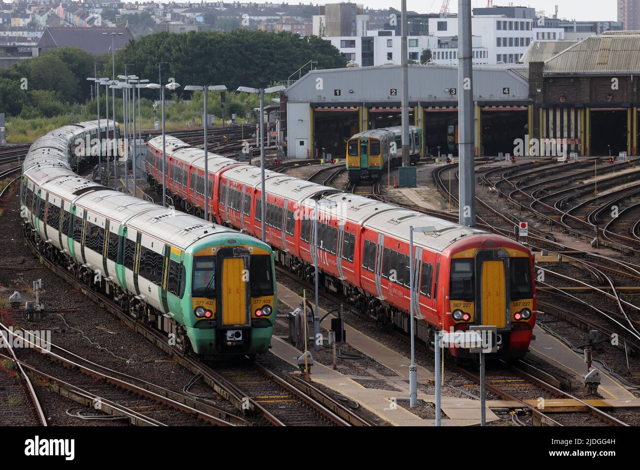Brighton, UK. 21st June, 2022. Trains standing in rail sidings near ...
