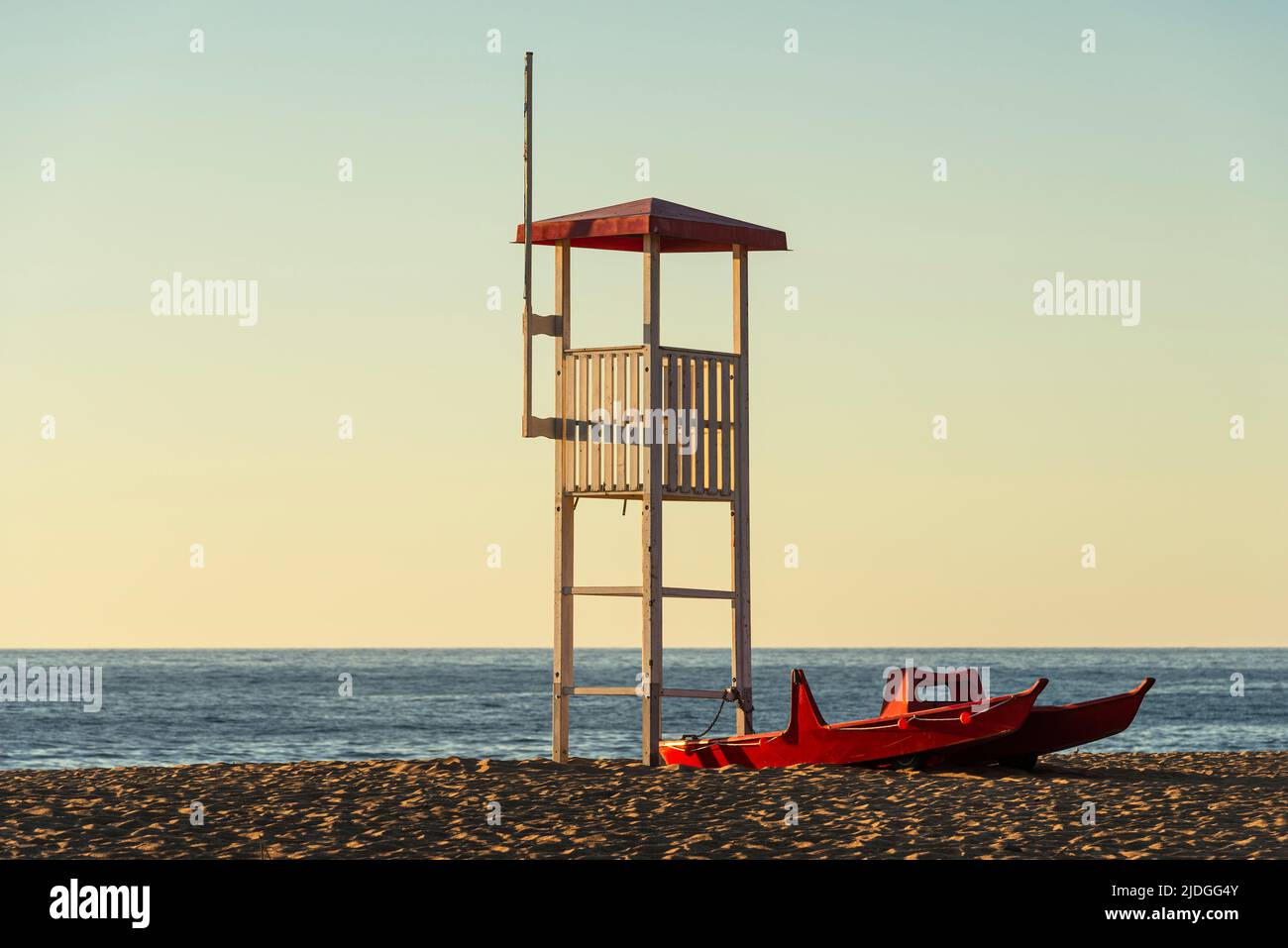 Salvataggio lifeguard watchtower and lifeboat on the sandy beach of ...